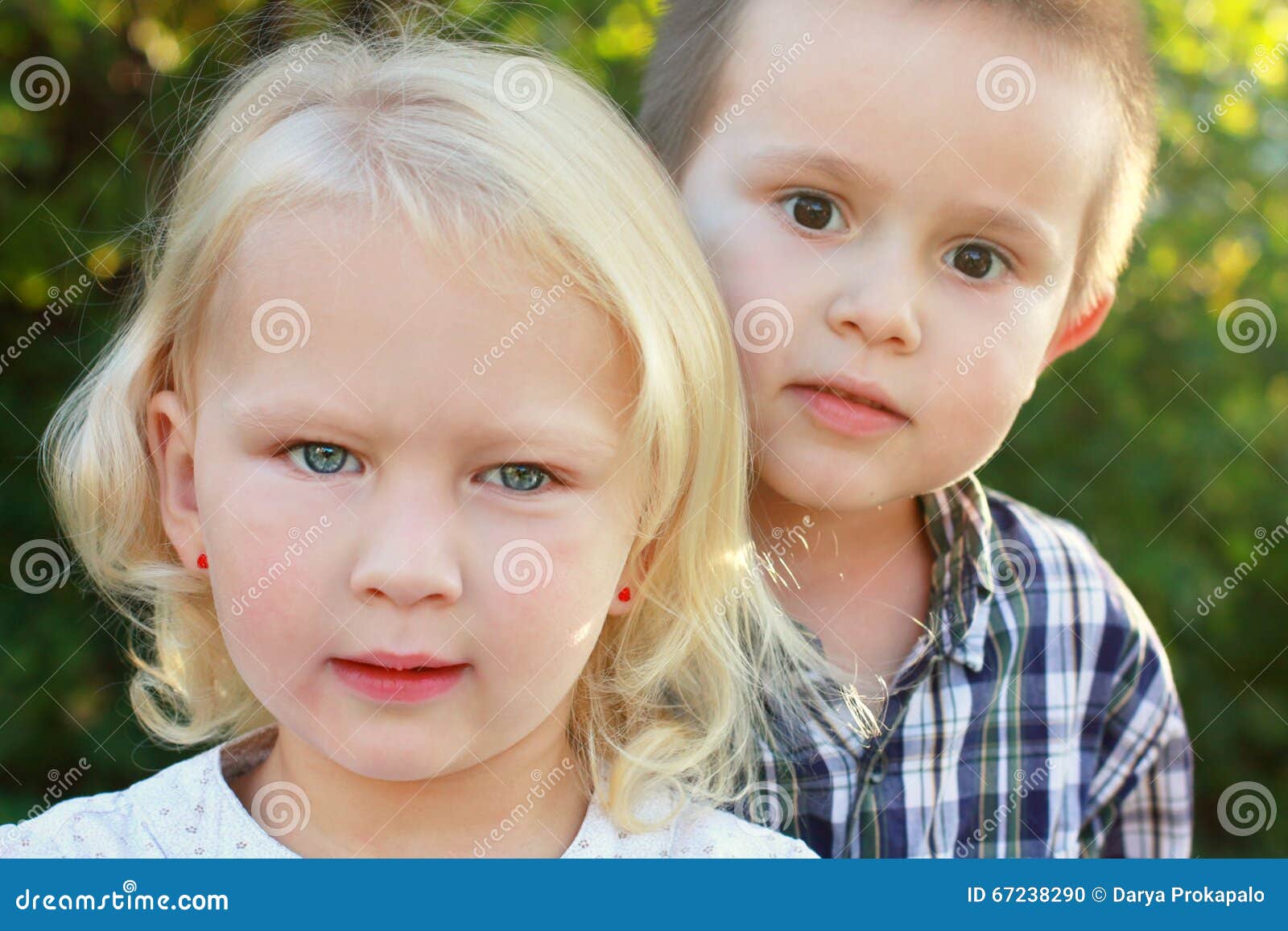 Two cute kids stock photo. Image of cute, summer, suspicious - 67238290