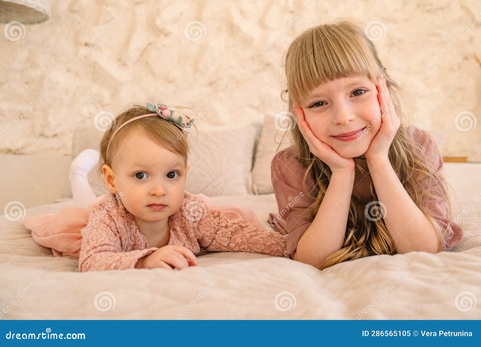 Two cute sisters portrait stock image. Image of sister - 286565105
