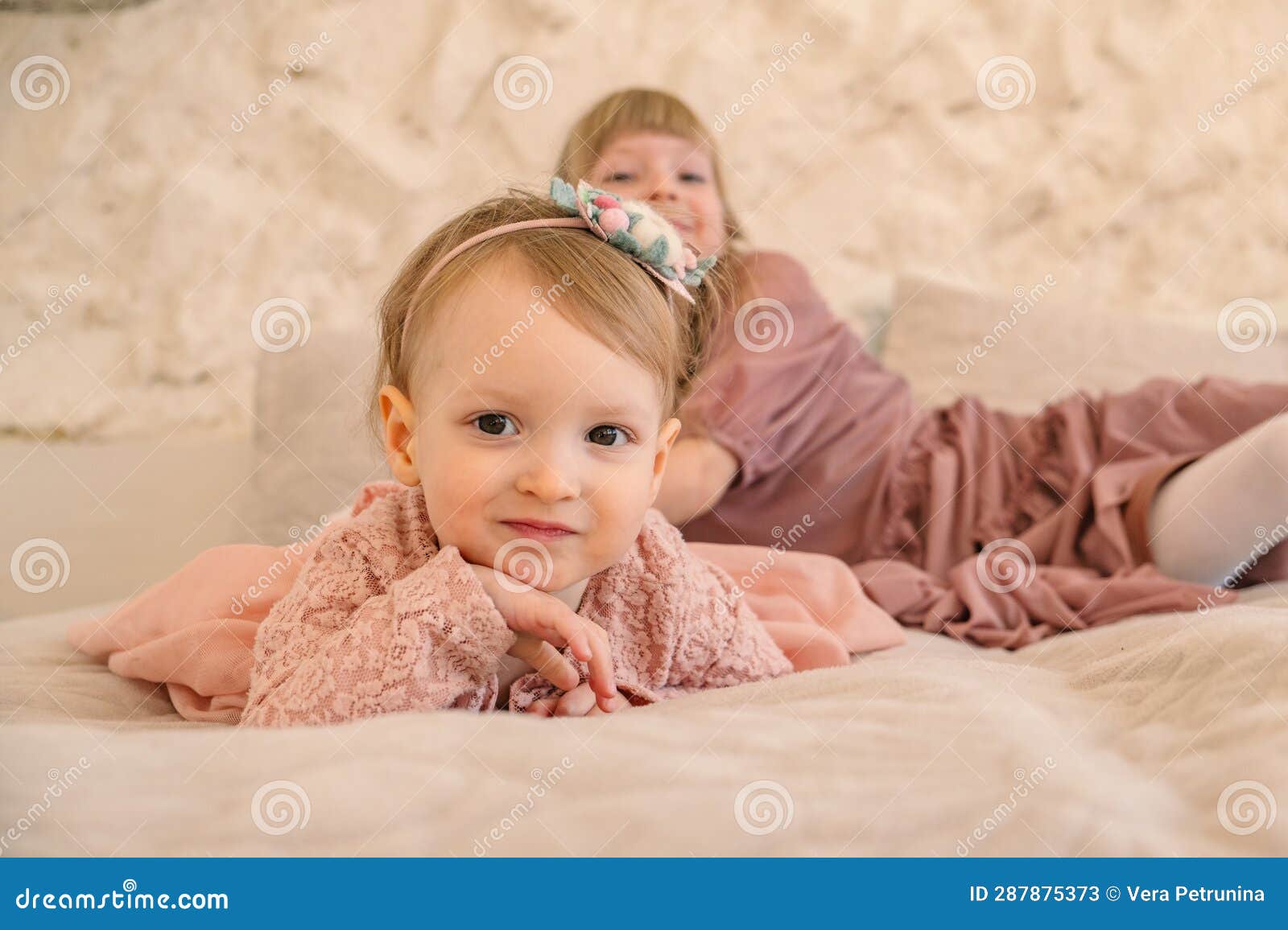 Two cute sisters portrait stock image. Image of sister - 287875373