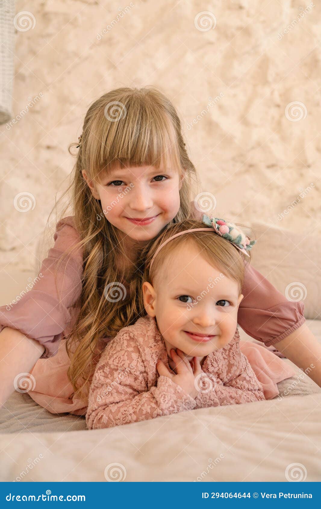 Two cute sisters portrait stock photo. Image of sister - 294064644