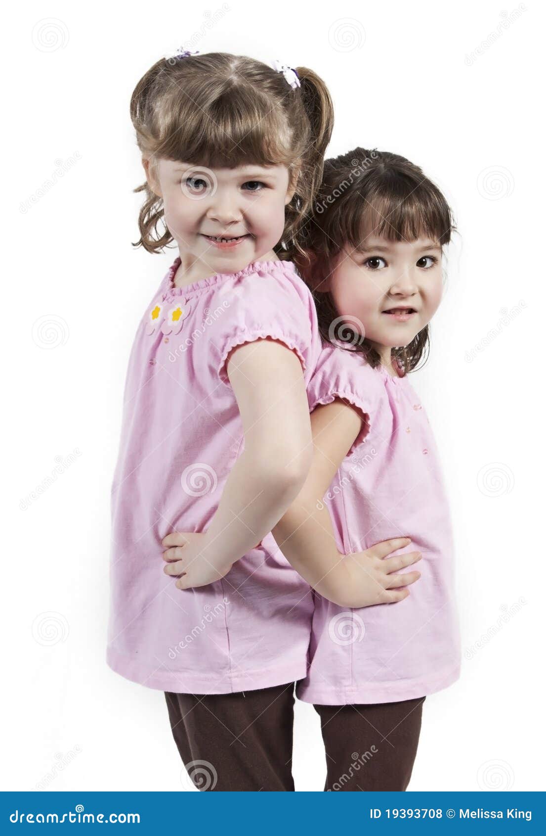 Two cute young sisters stock photo. Image of friends - 19393708