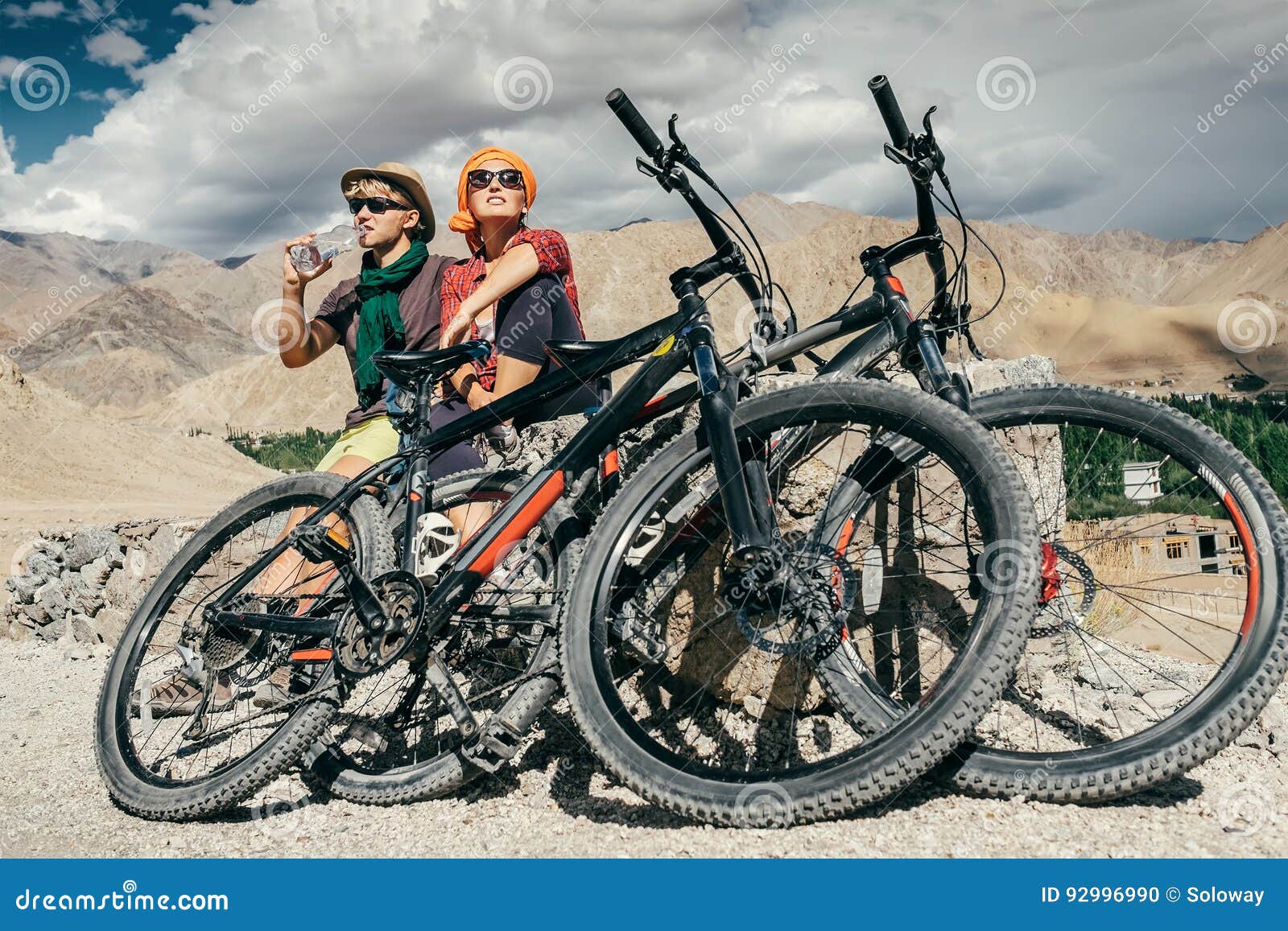 Two Cyclists Rest on the Mountain Road Stock Photo - Image of couple ...