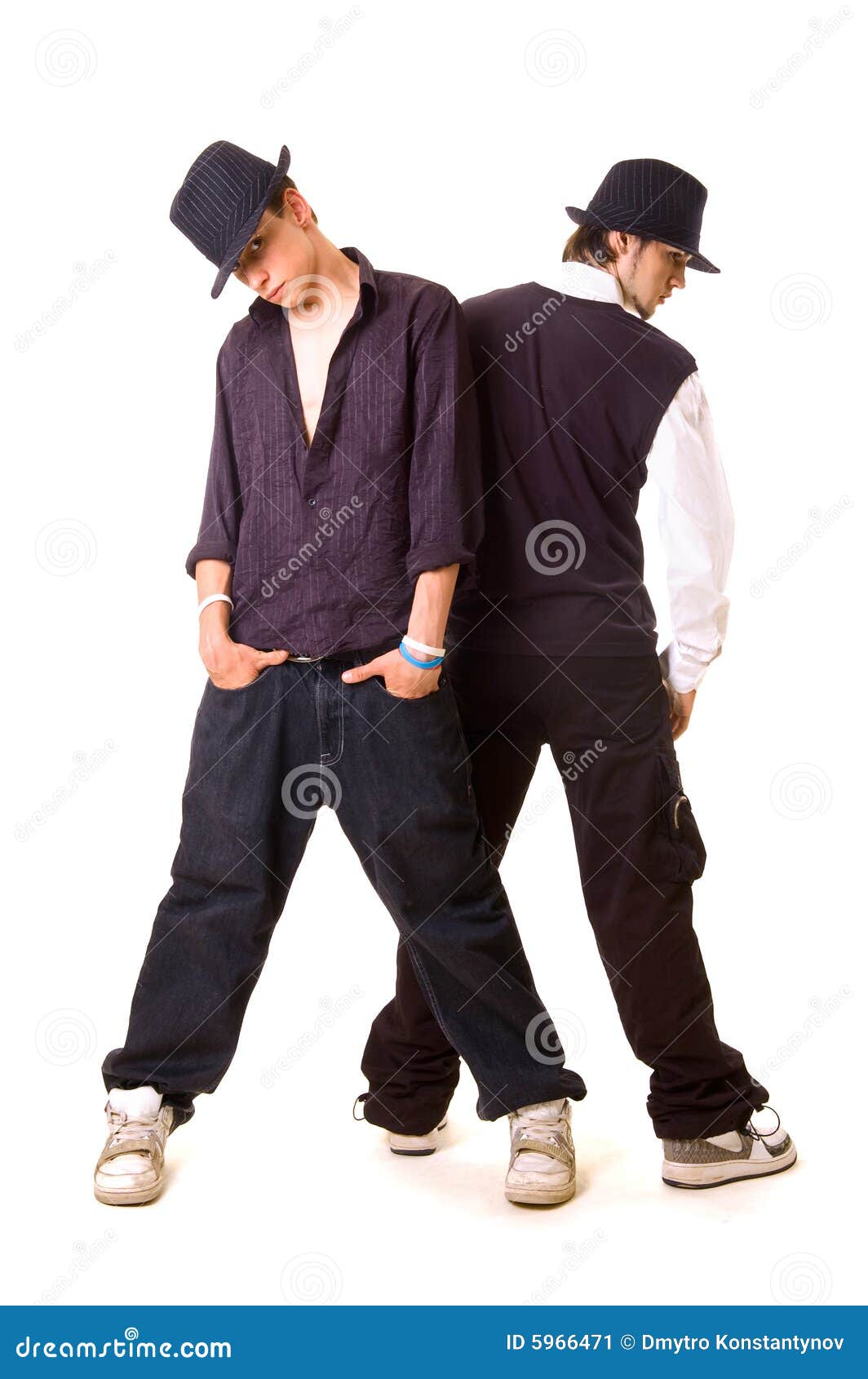 Two Dancers Standing Back To Back Stock Image - Image of style, gaze ...