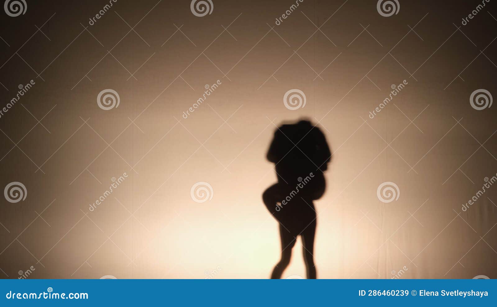 Two Dancing Shadows on the Background of a White Wall. Artistic ...