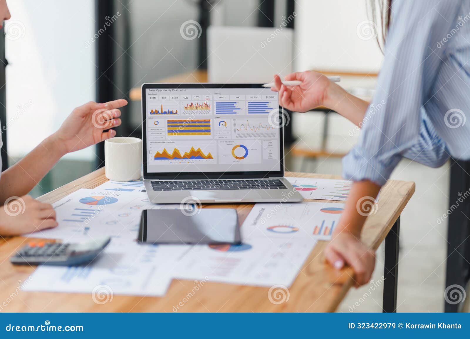 Two Data Analysts Working on Data Analysis Dashboard for Business ...