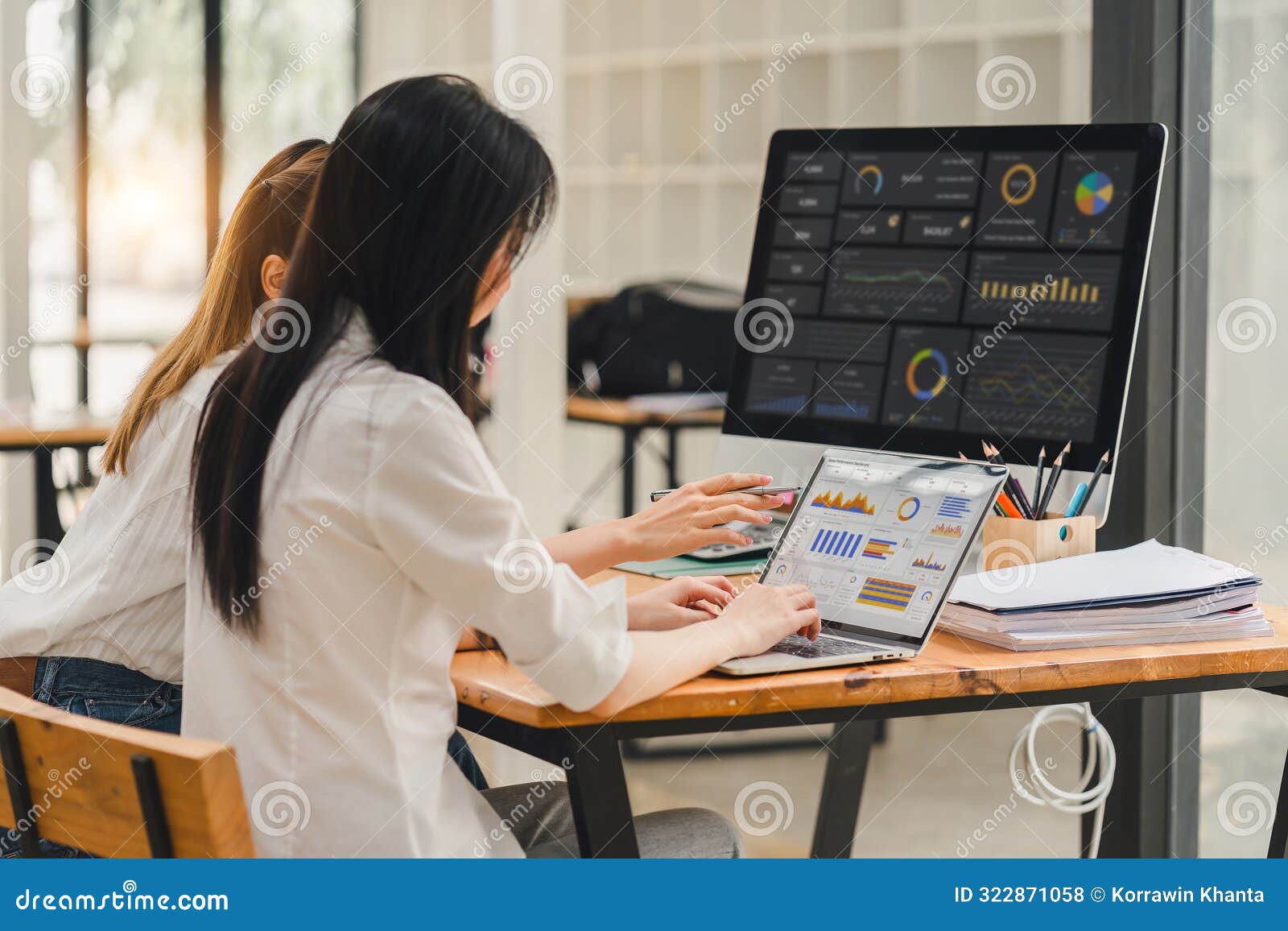 Two Data Analysts Working on Data Analysis Dashboard for Business Strategy. Stock Photo - Image ...