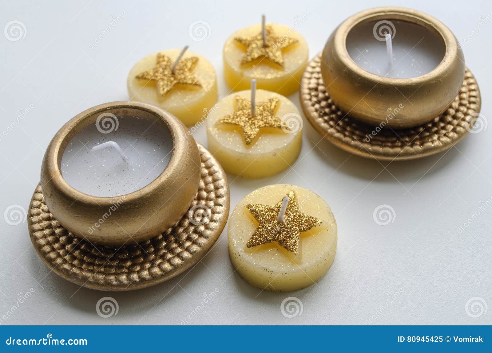 Two Decorative Candles in Gold Color and Four Candles with Star Pattern ...