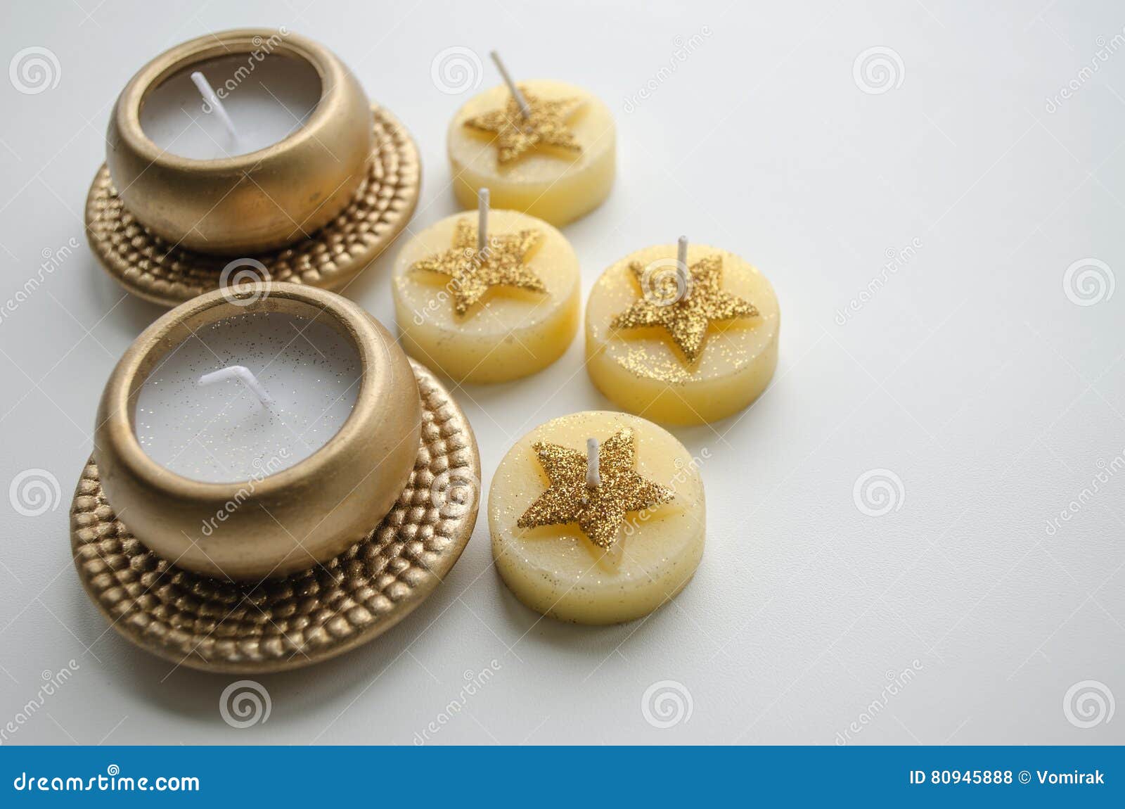 Two Decorative Candles in Gold Color and Four Candles with Star Pattern ...