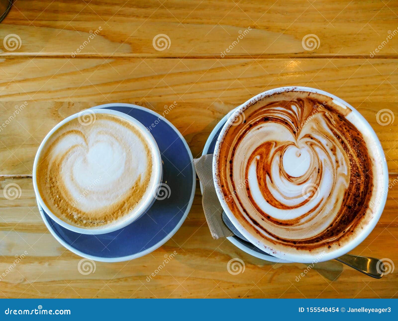 Two Coffees on a Honey Colored Table Stock Photo - Image of moca, table ...