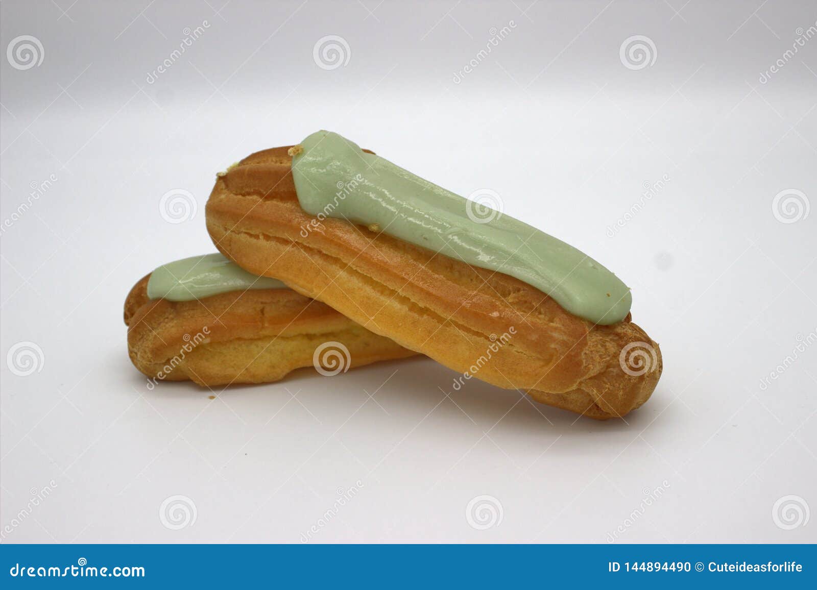 Two Delicious Pistachio Eclairs. an Isolated Image on White Background ...
