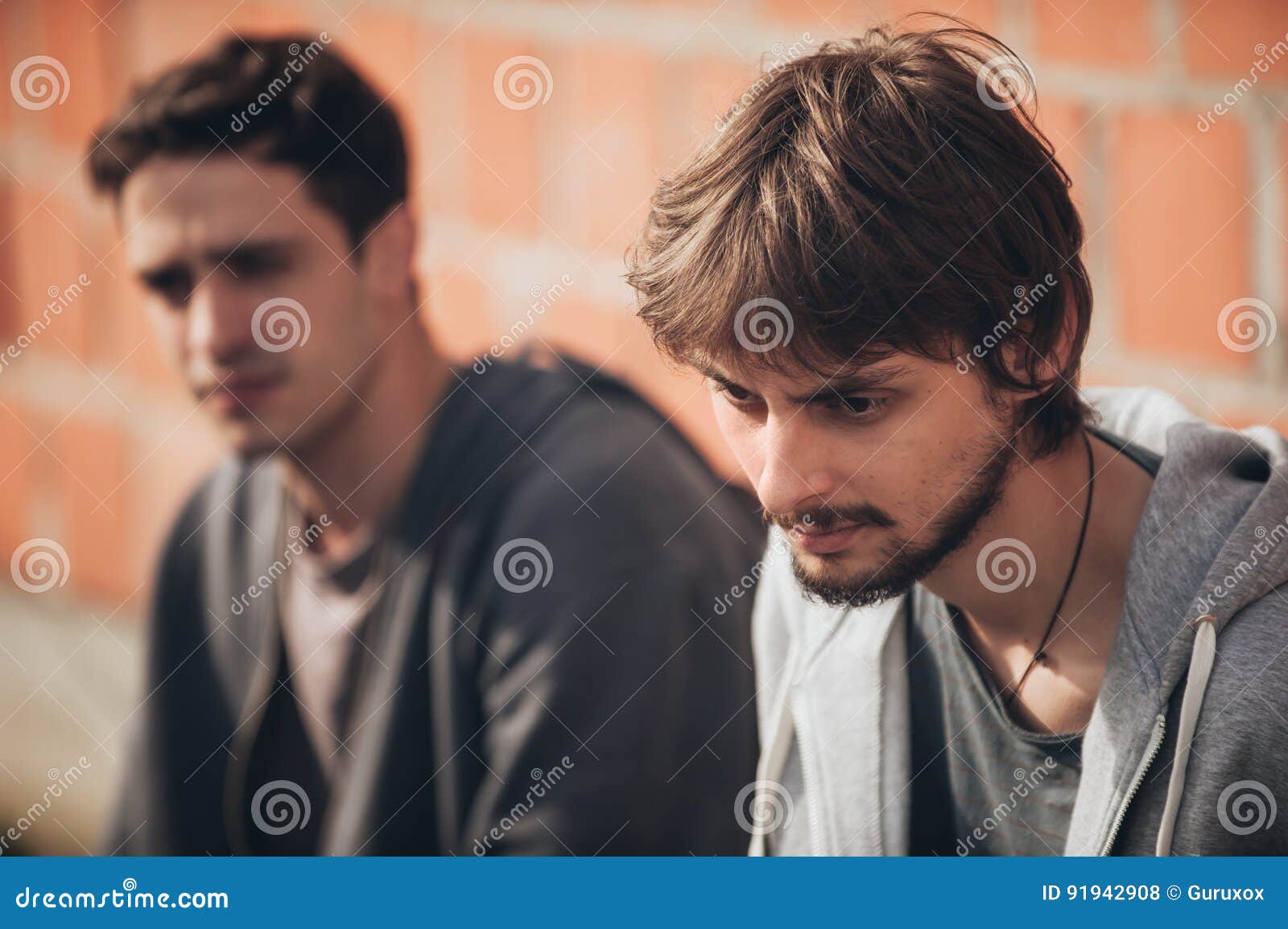 Two Depressed and Sad Young Buddies Friends Thinking about Problems ...