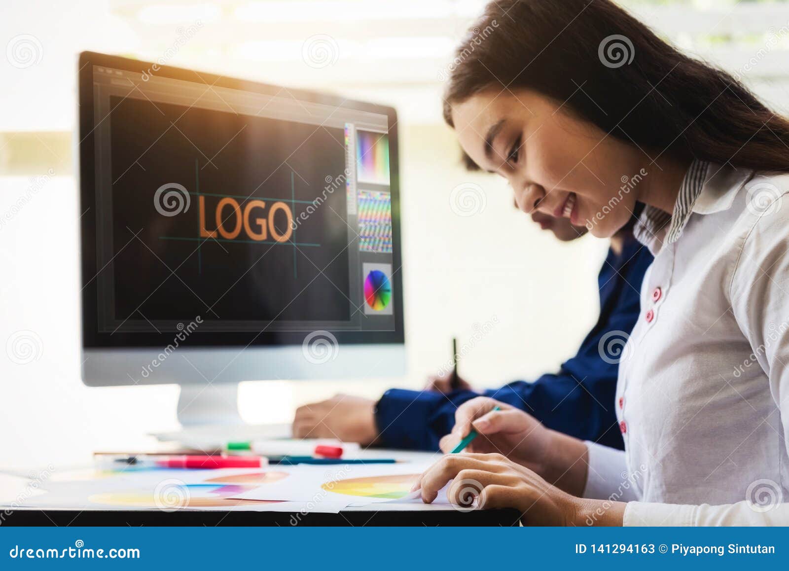 Two Designer Graphic Creative People Working about Website Design with ...