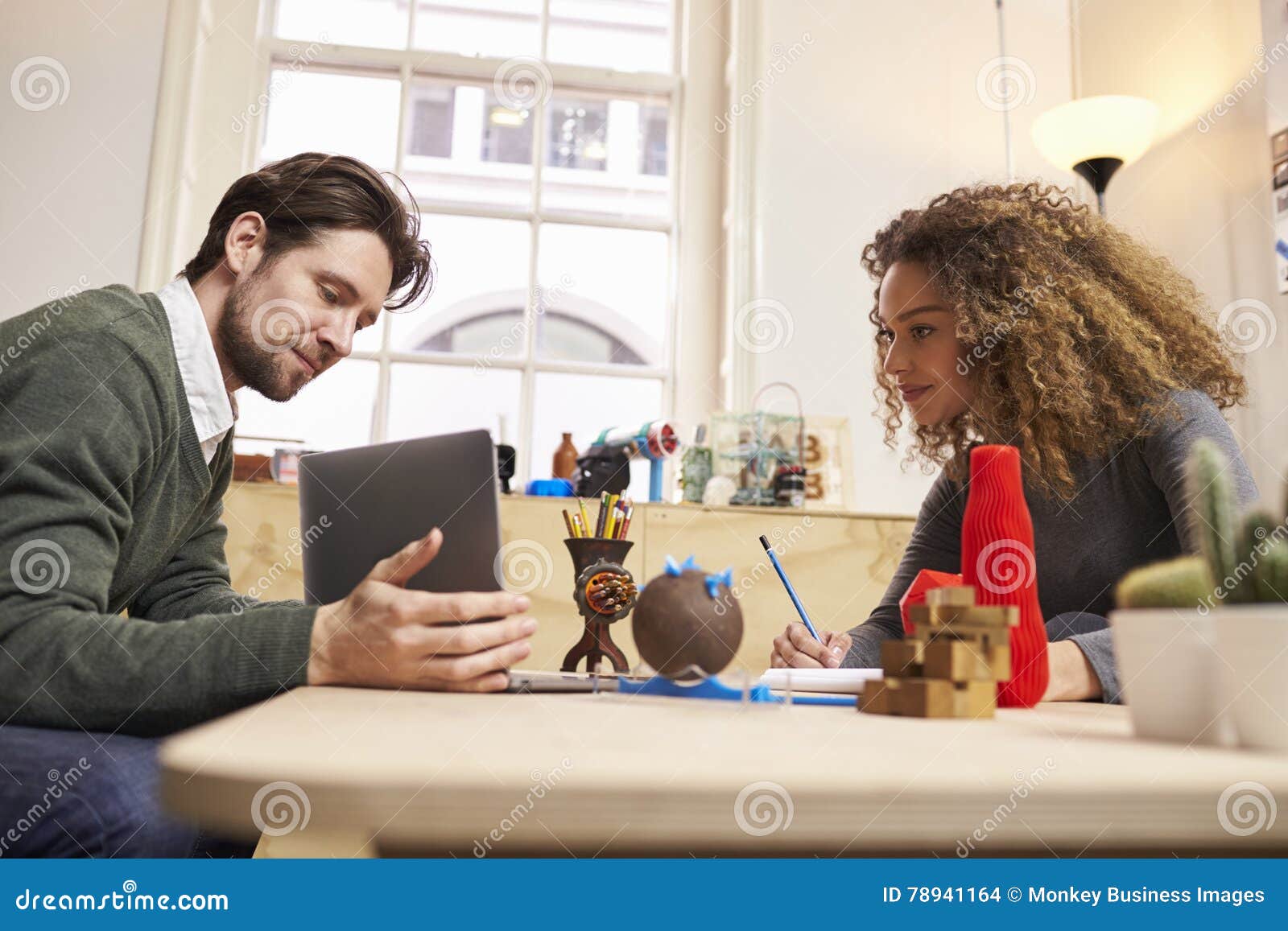 Two Designers Having Creative Meeting in Modern Office Stock Photo ...