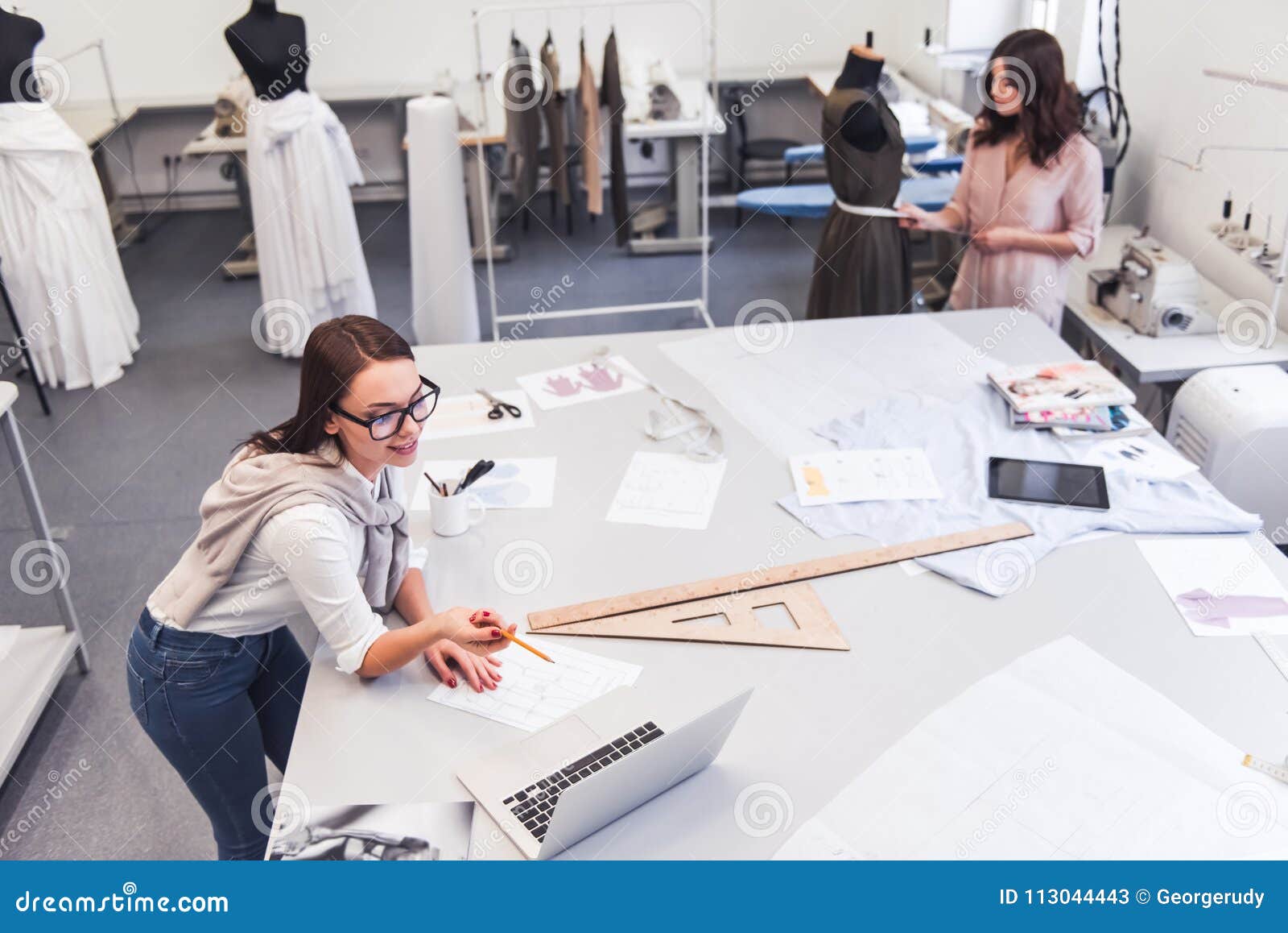 Two designers working stock image. Image of designer - 113044443