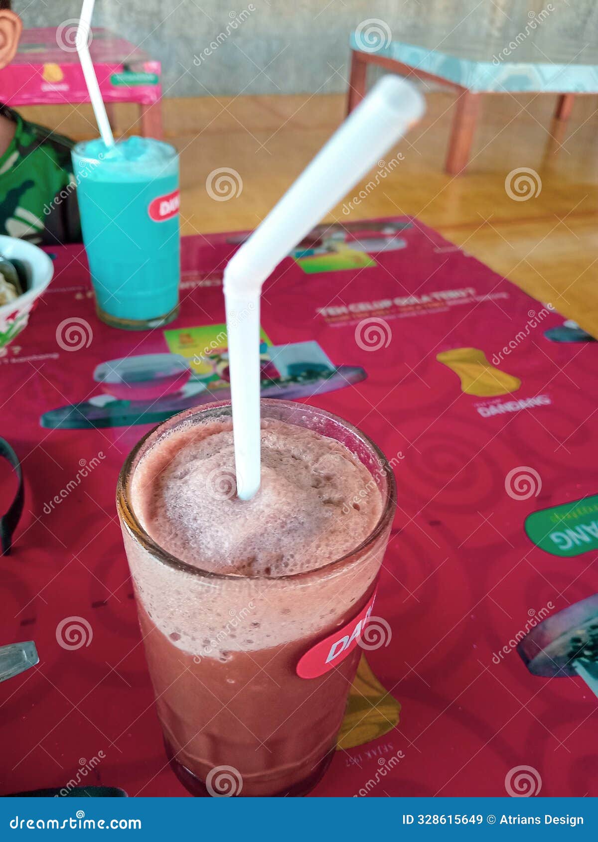 Two Different Chocolate and Bubble Gum Flavored Drinks Served with ...