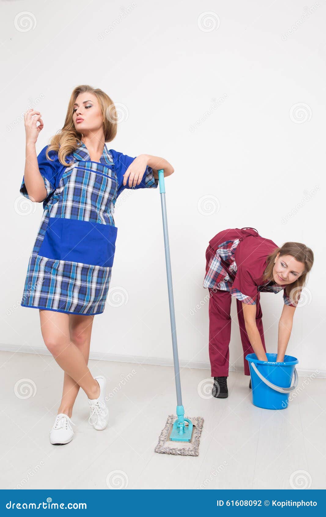 Two Different Cleaners Compete. Poor Staff Stock Photo - Image of ...