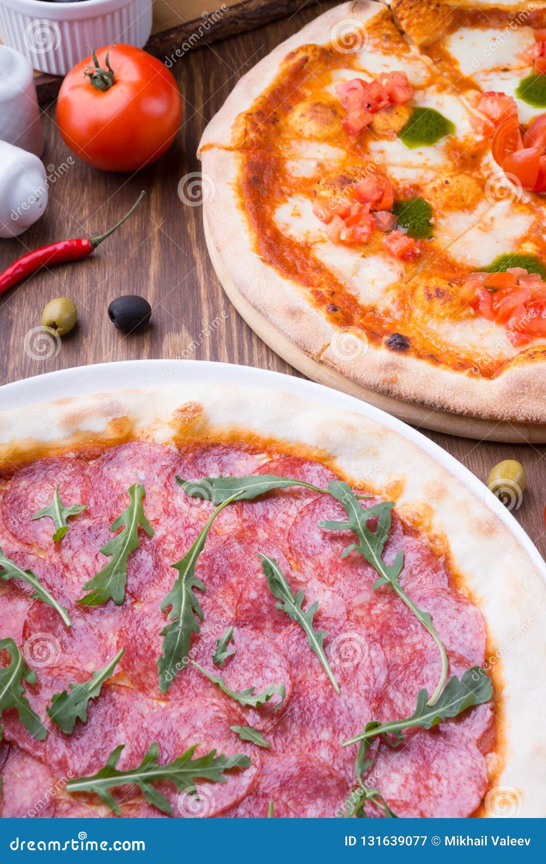 Two Different Pizzas Freshly Baked and Served on Wooden Table Stock ...