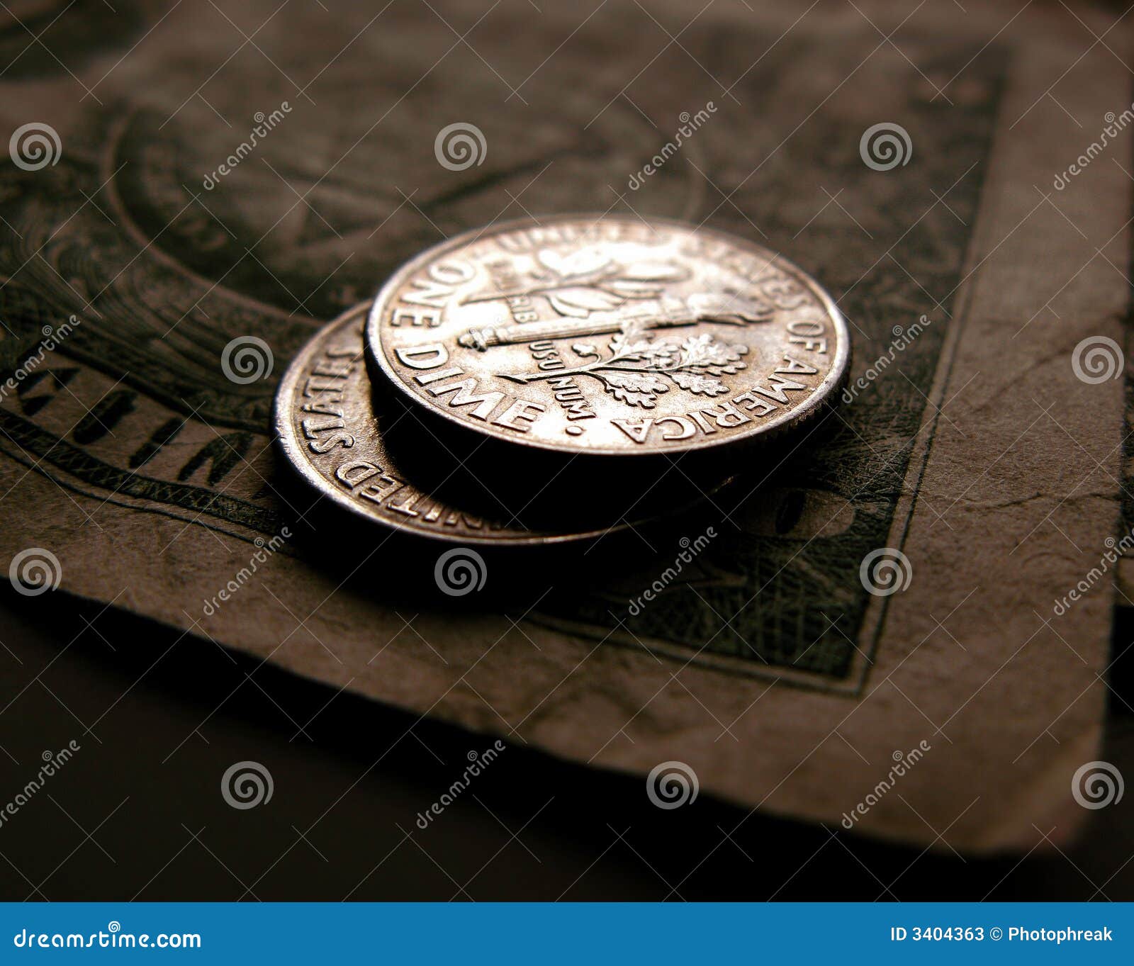 Two Dimes On A Dollar Bill Picture. Image: 3404363