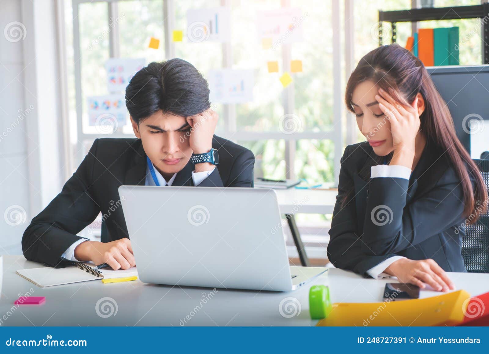 Two Disappointed Business Person Looking at Computer Screen with Upset ...