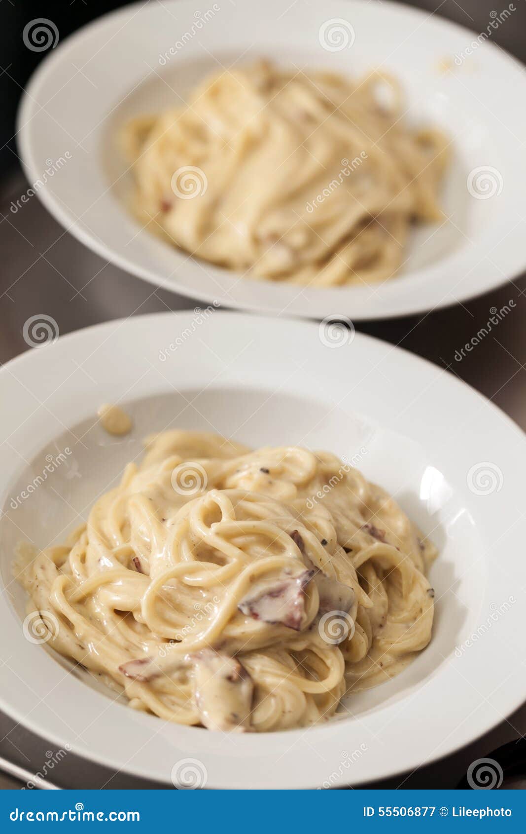 Two Dishes with Spaghetti. stock image. Image of fresh - 55506877