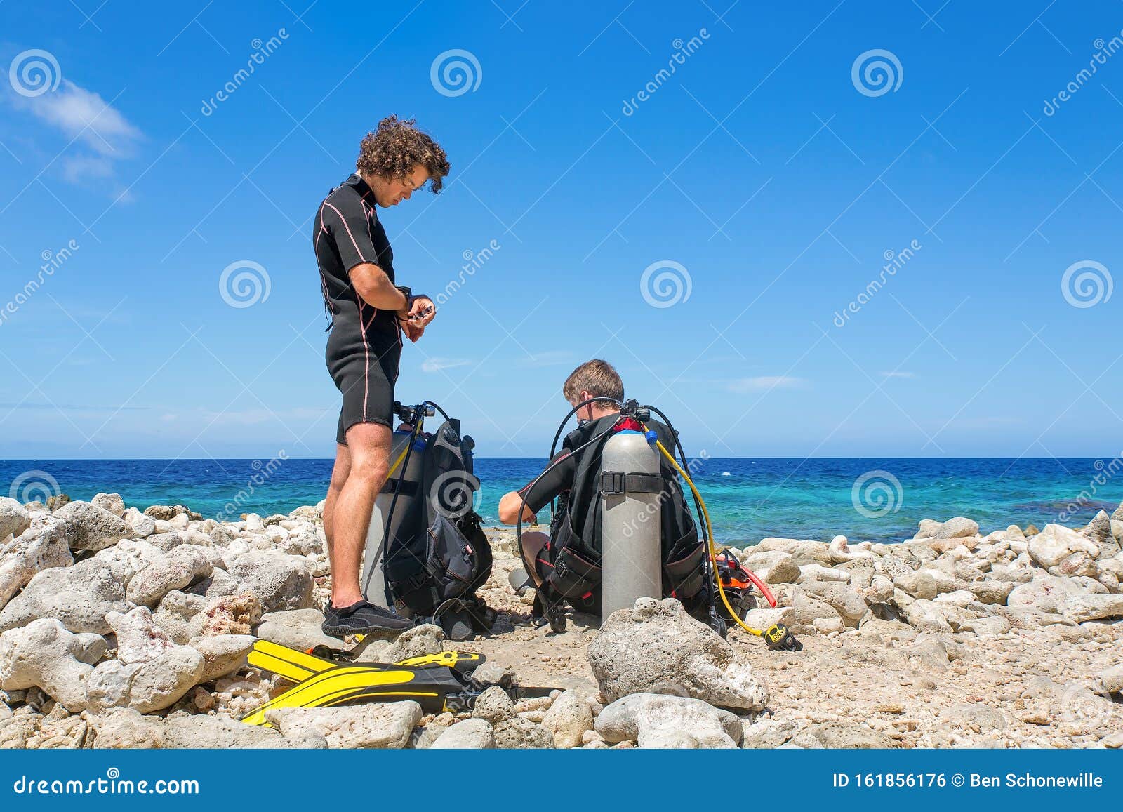 Two Divers on the Beach Prepare for Diving Stock Photo - Image of ...