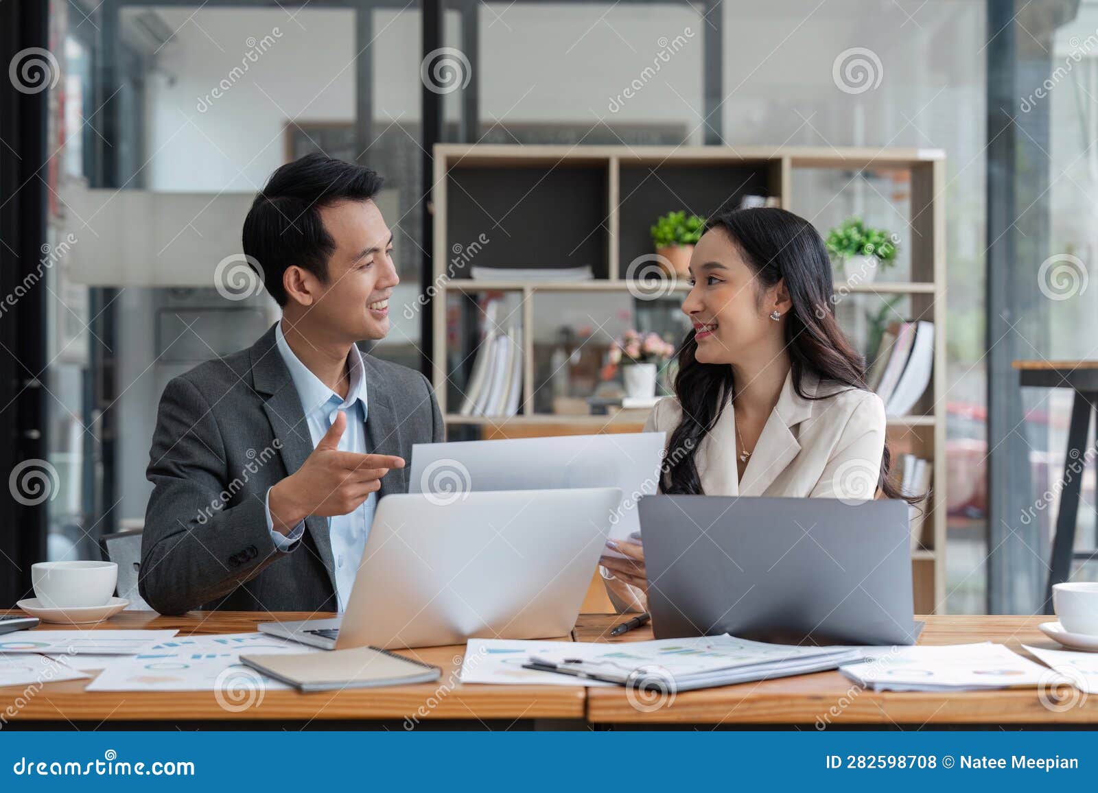 Two Diverse Business Colleagues Talking, Discuss Online Presentation ...
