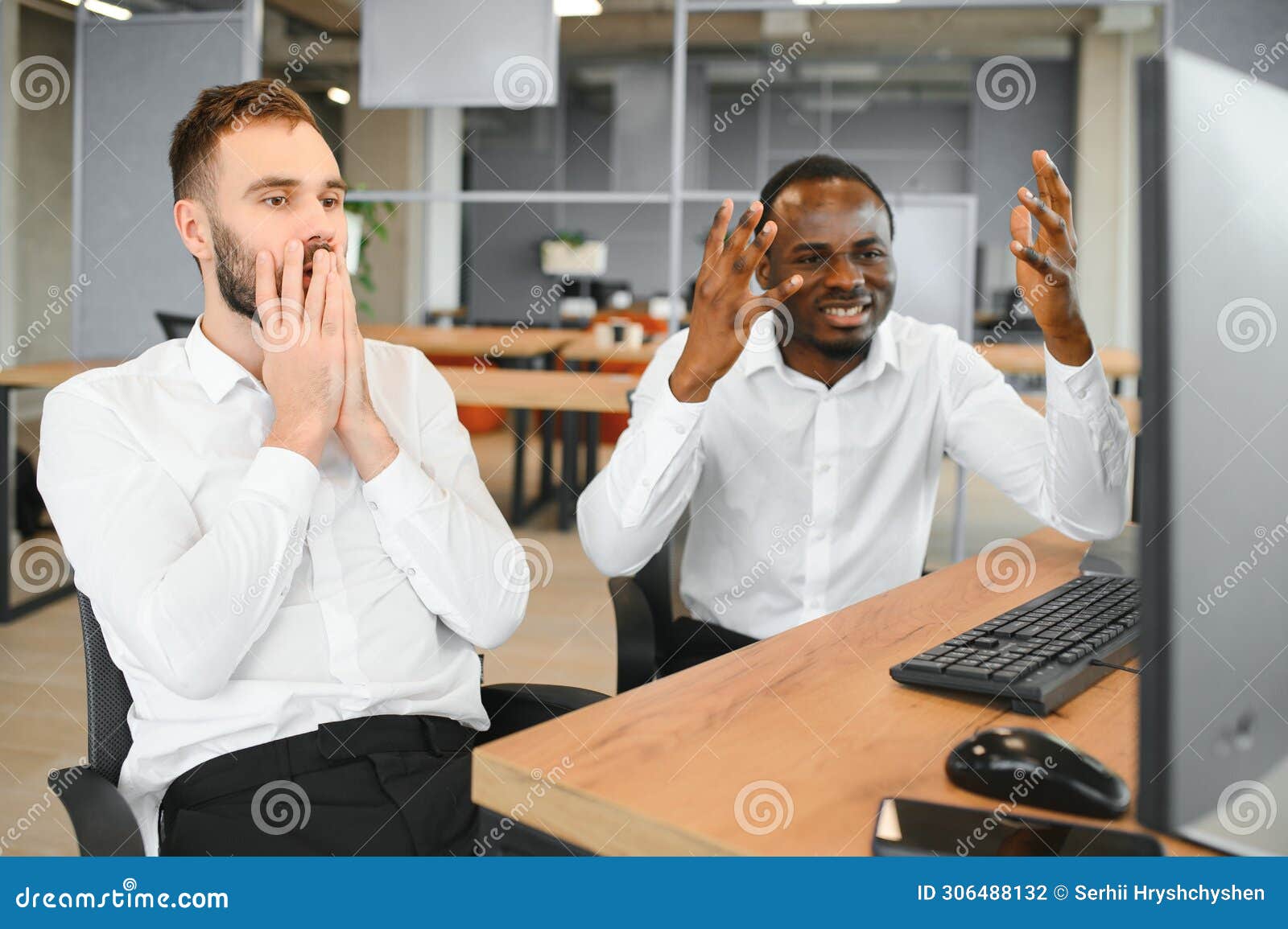 Two Diverse Colleagues Traders Talking To Each Other, Sitting in the ...