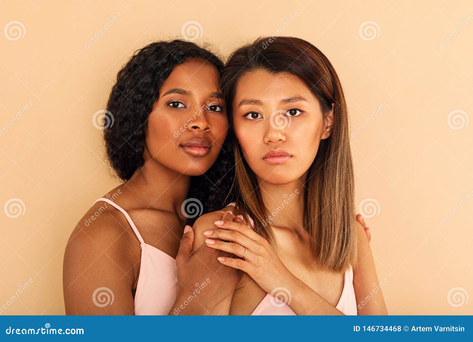 Two diverse women friends stock photo. Image of skin - 146734468