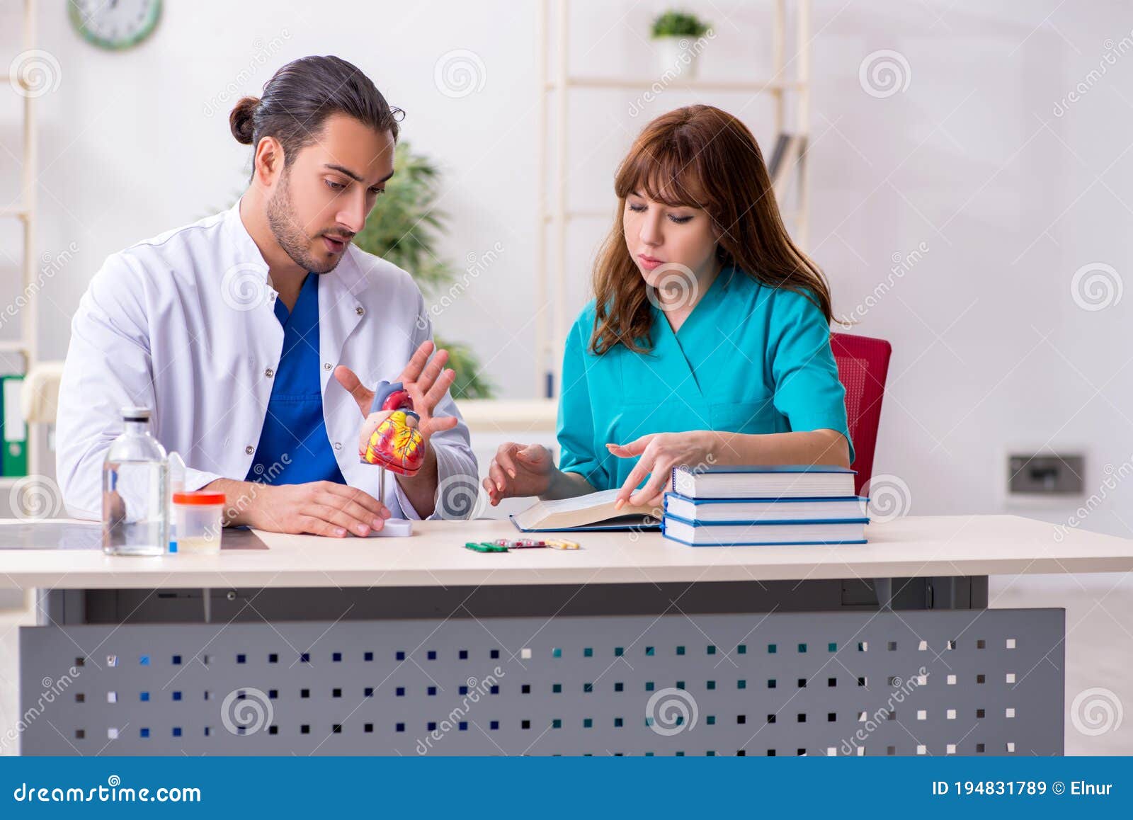 Two Doctors Colleagues Working in the Hospital Stock Image - Image of ...