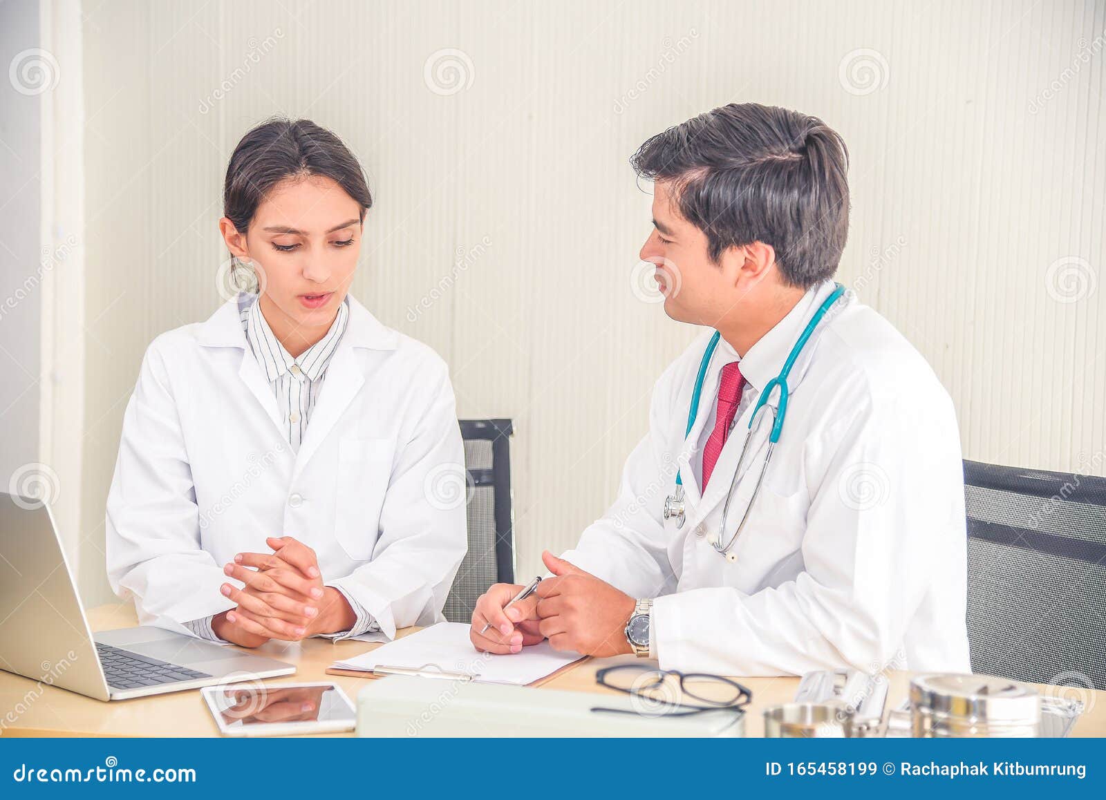 Two Doctors Discuss and Ask for Each Other Opinion about Patient Case ...