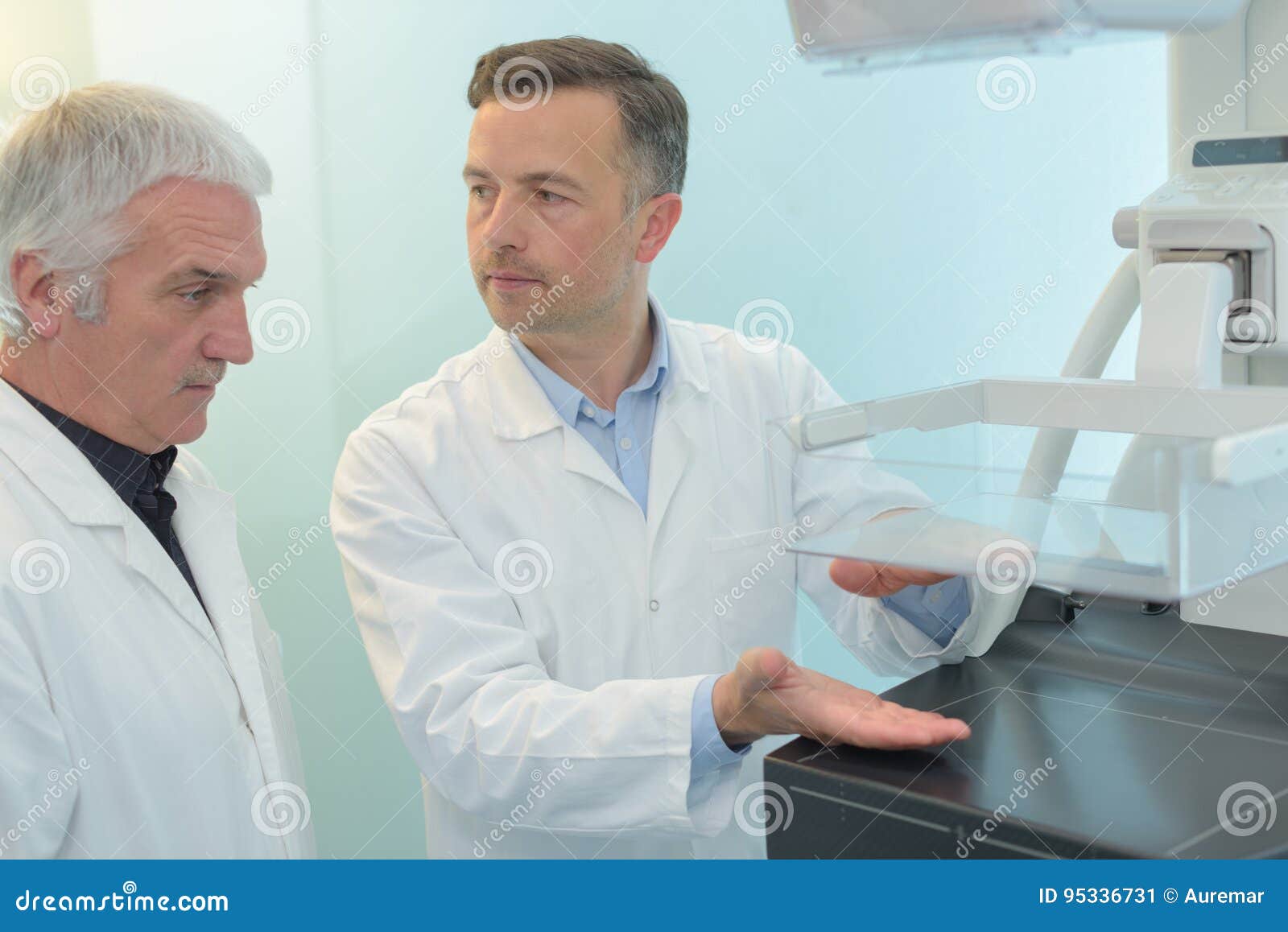 Two Doctors Discussing New Methods Approvement at Hospital Stock Image ...