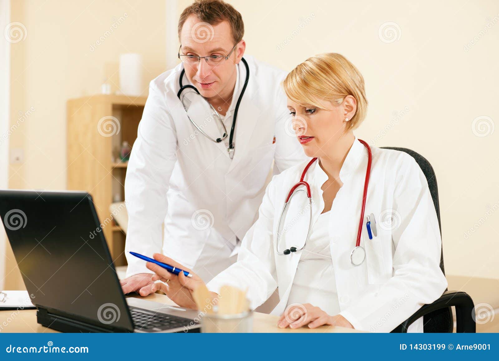 Two Doctors Discussion Documents or Test Results Stock Image - Image of ...