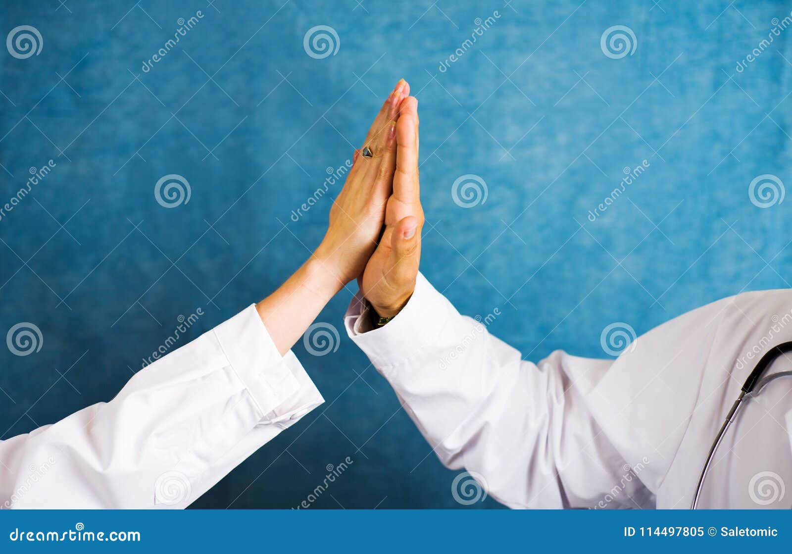 Two Doctors Doing High Five Close Up Stock Image - Image of high ...