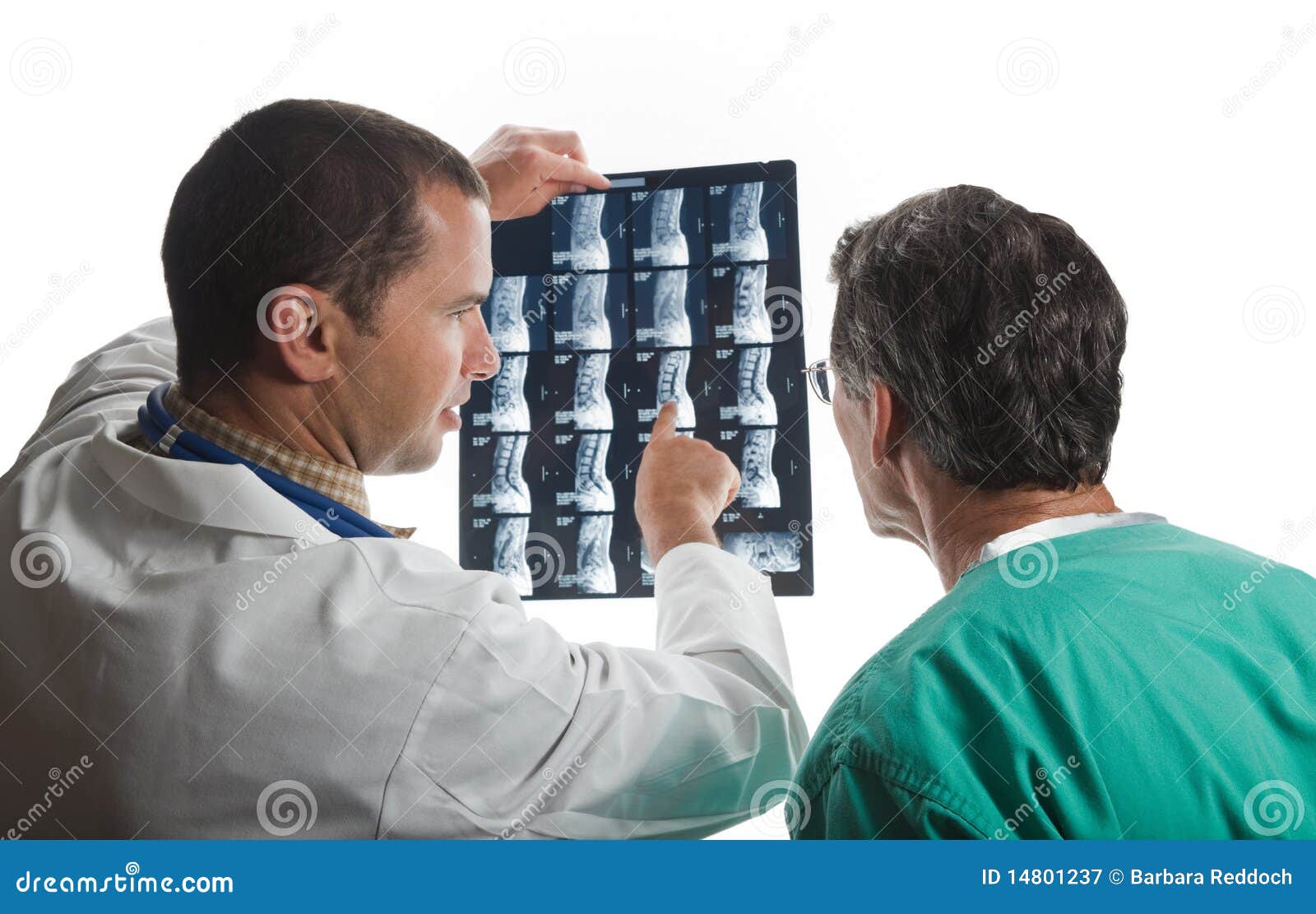 Two Doctors Examining Patient S Spinal Film Scans Stock Image - Image ...