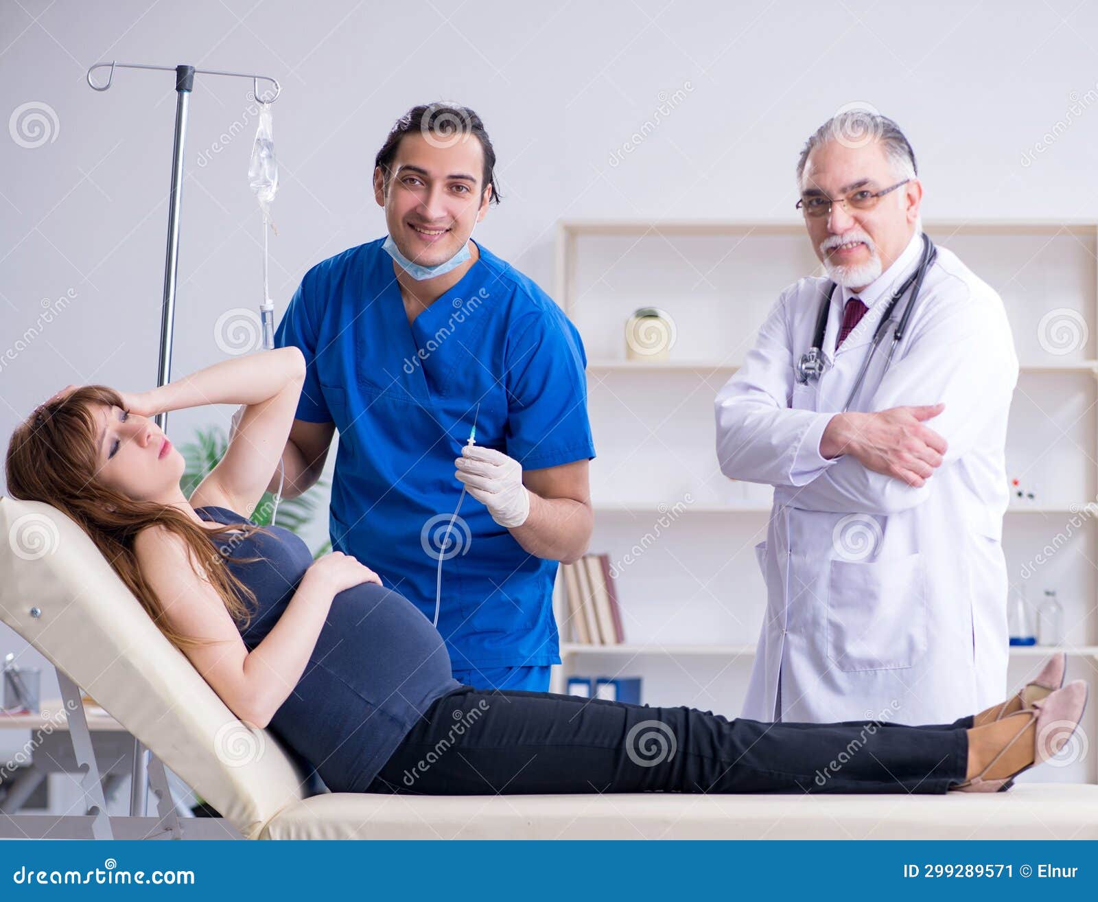 Two Doctors Examining Young Woman Stock Image - Image of case ...
