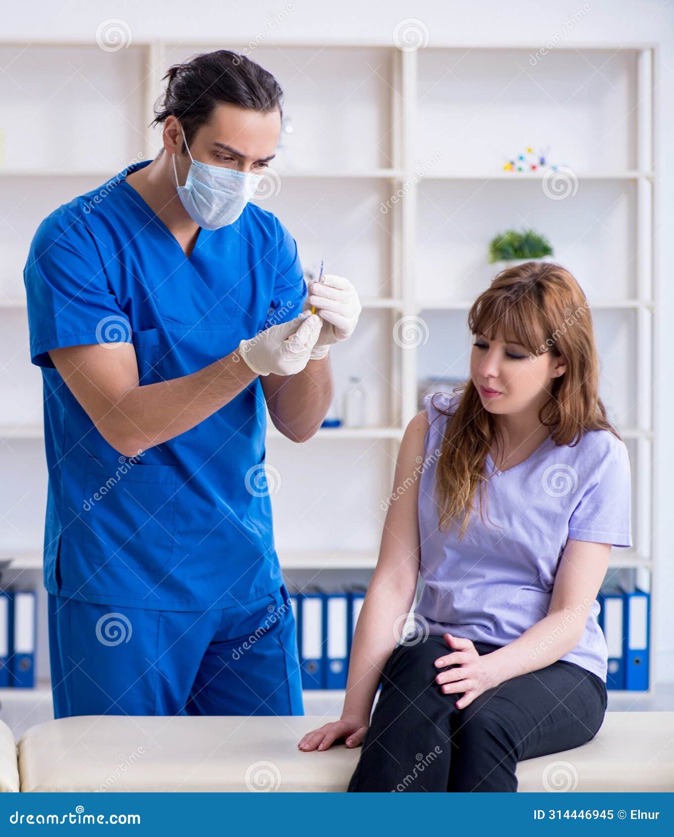 Two Doctors Examining Young Woman Stock Image - Image of discussing ...