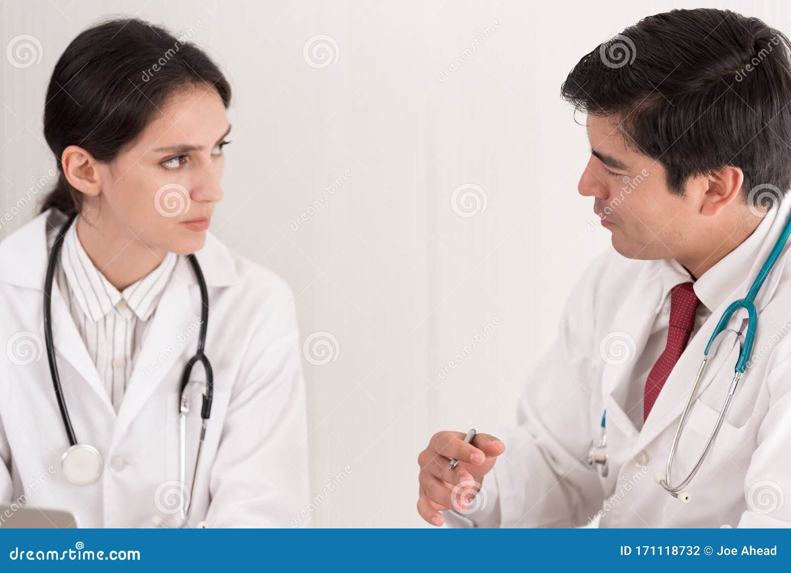 Two Doctors Have Working Together with Happiness in the Hospital Stock ...