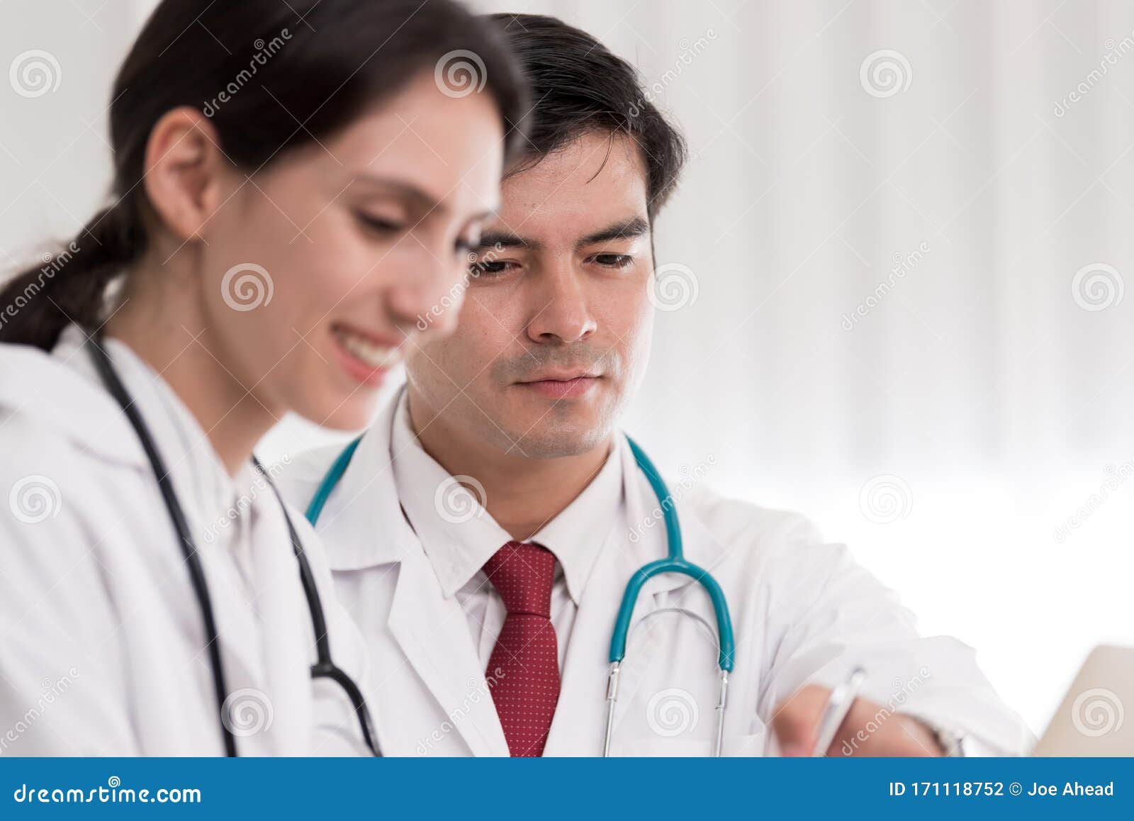 Two Doctors Have Working Together with Happiness in the Hospital Stock ...
