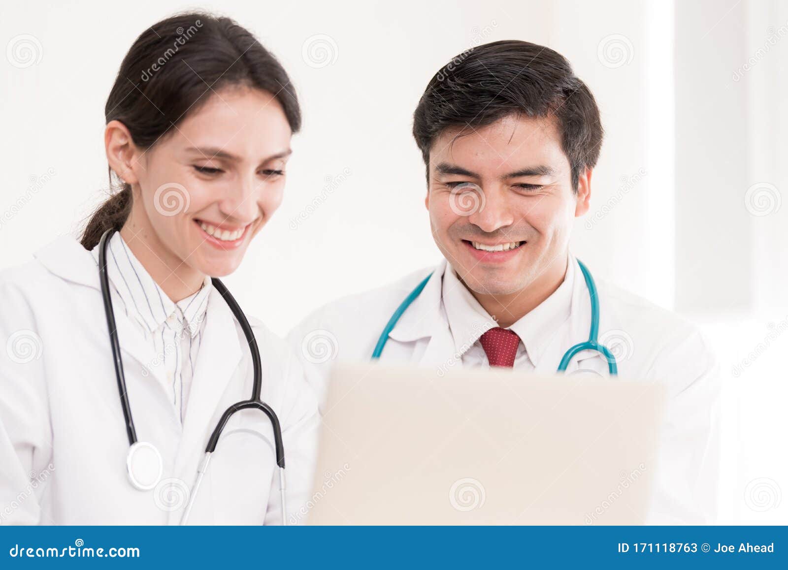 Two Doctors Have Working Together with Happiness in the Hospital Stock ...