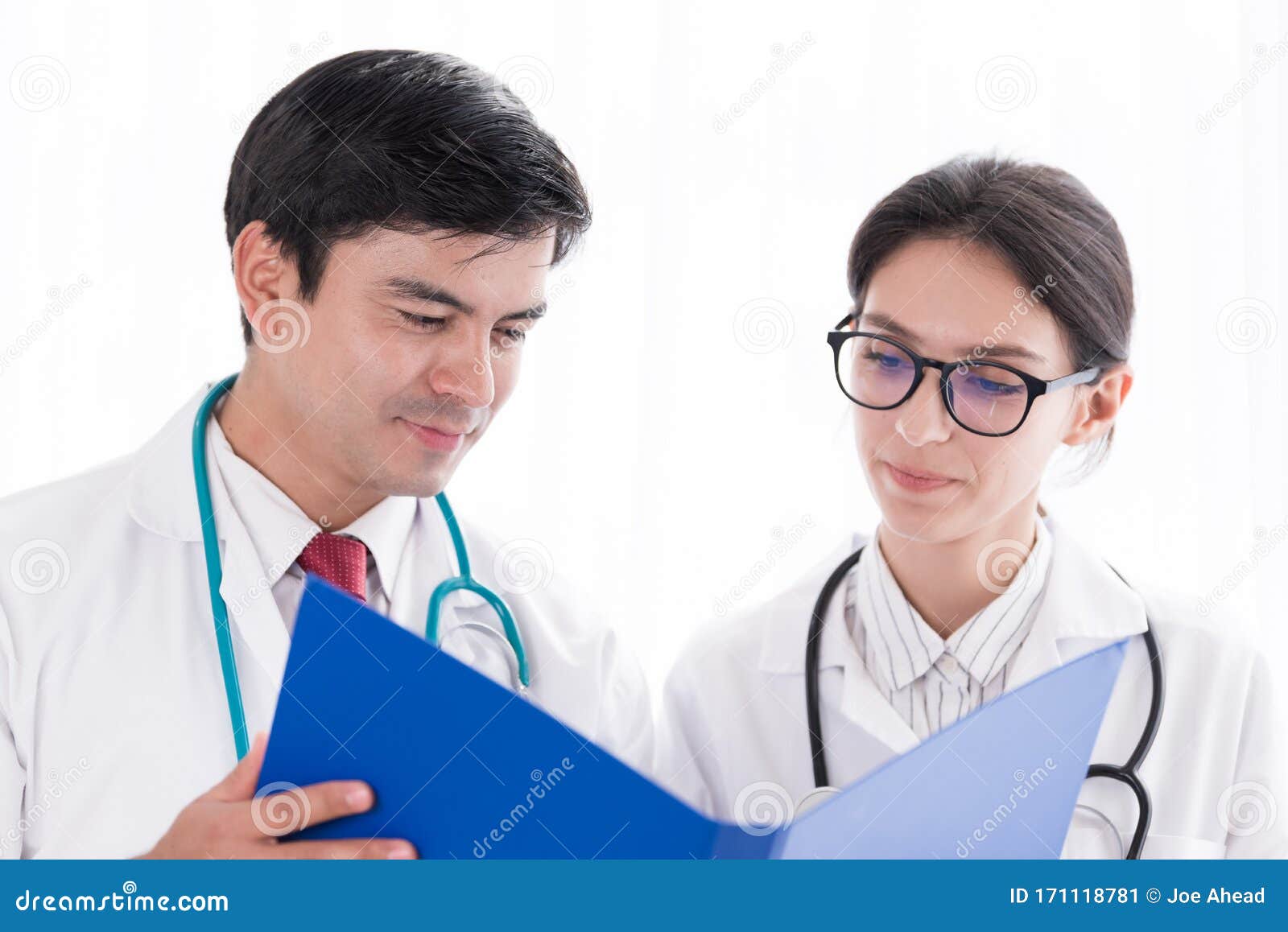 Two Doctors Have Working Together with Happiness in the Hospital Stock ...