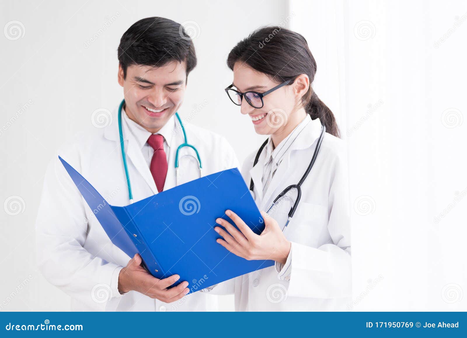 Two Doctors Have Working Together with Happiness in the Hospital Stock ...