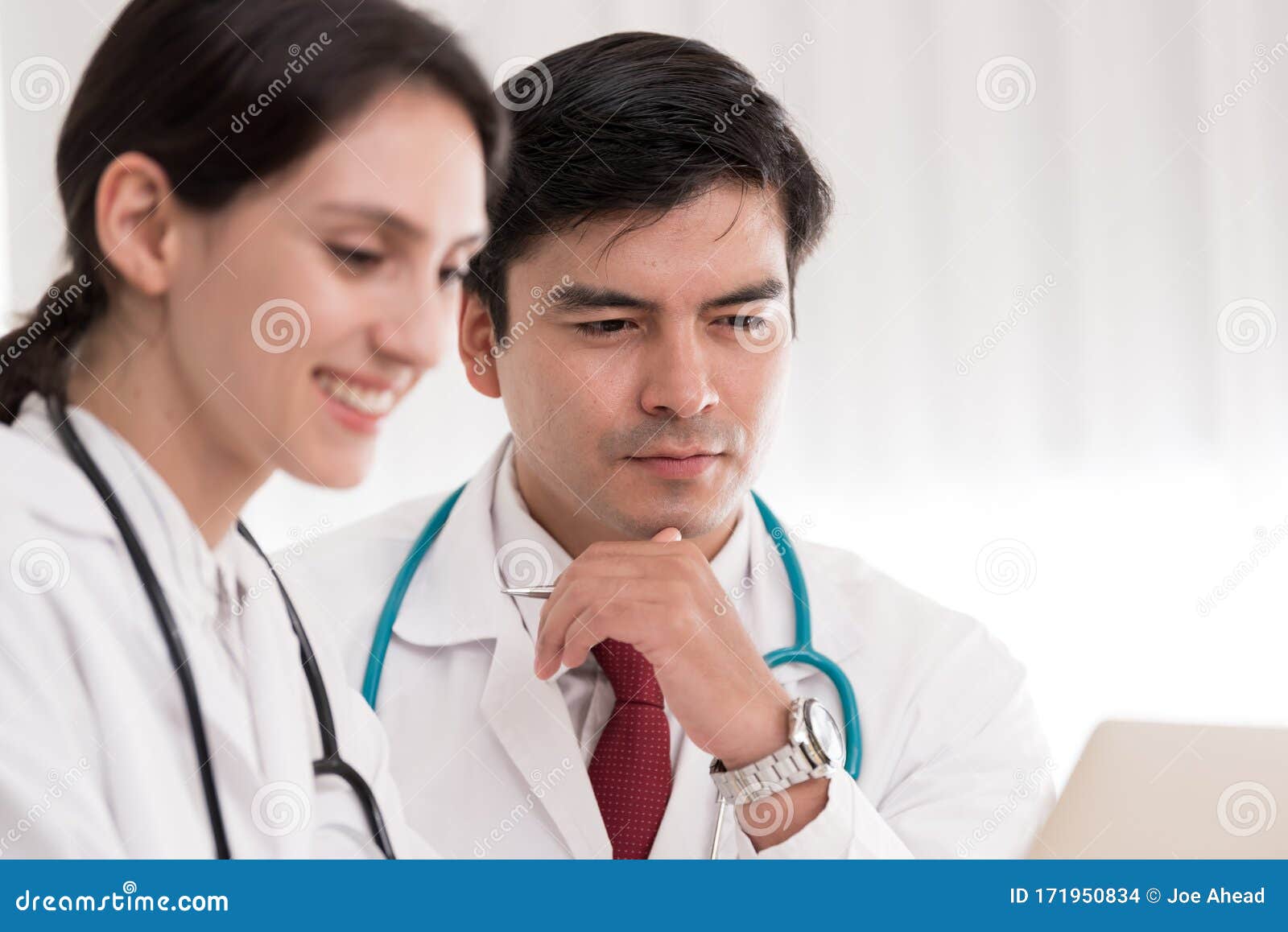 Two Doctors Have Working Together with Happiness in the Hospital Stock ...