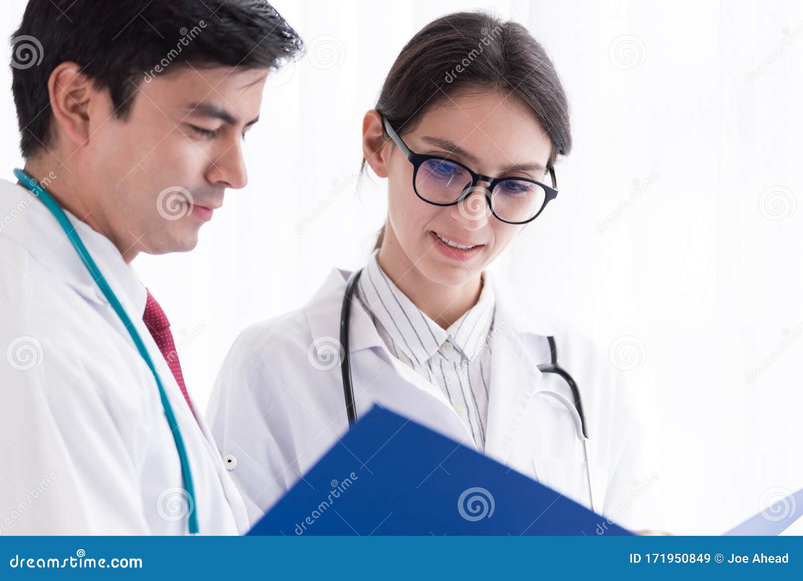 Two Doctors Have Working Together with Happiness in the Hospital Stock ...