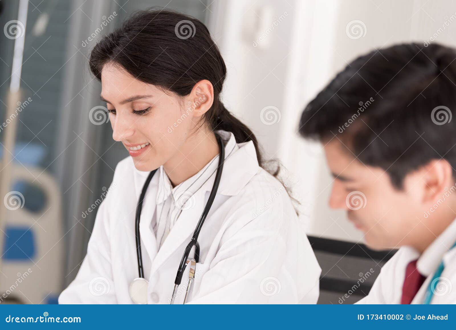 Two Doctors Have Working Together with Happiness in the Hospital Stock ...