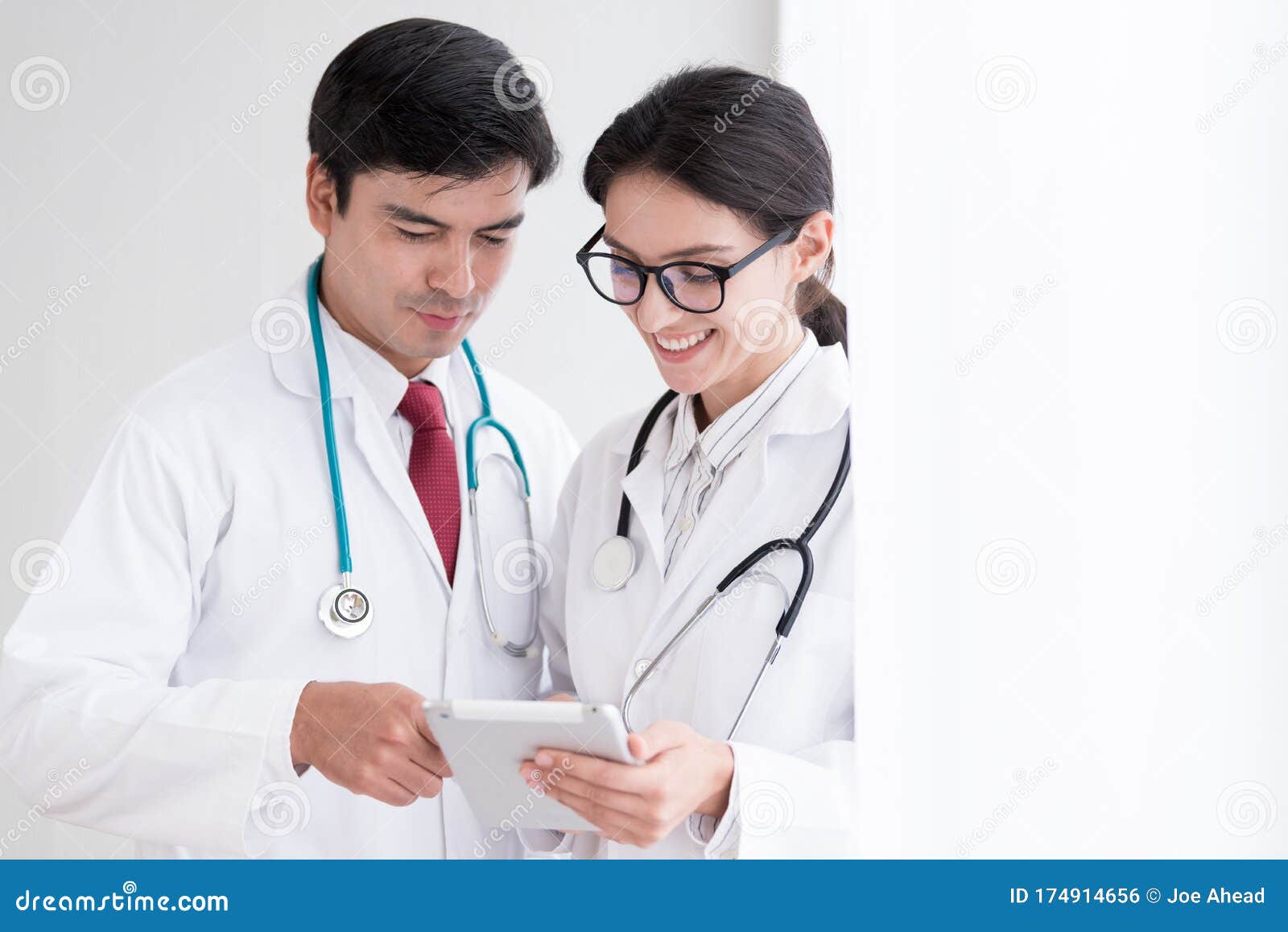 Two Doctors Have Working Together with Happiness in the Hospital Stock ...