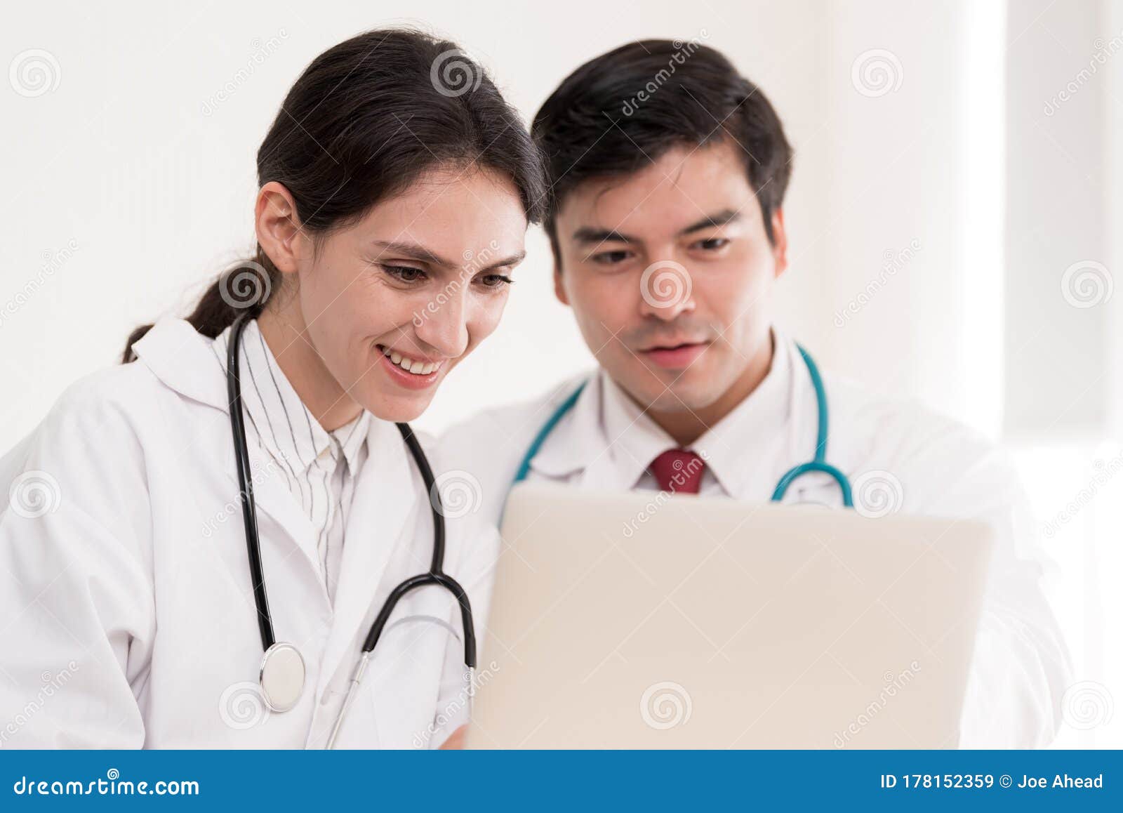 Two Doctors Have Working Together with Happiness in the Hospital Stock ...