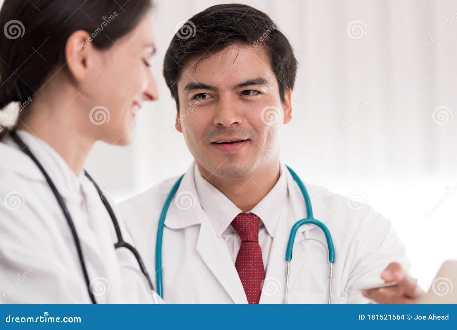 Two Doctors Have Working Together with Happiness in the Hospital Stock ...