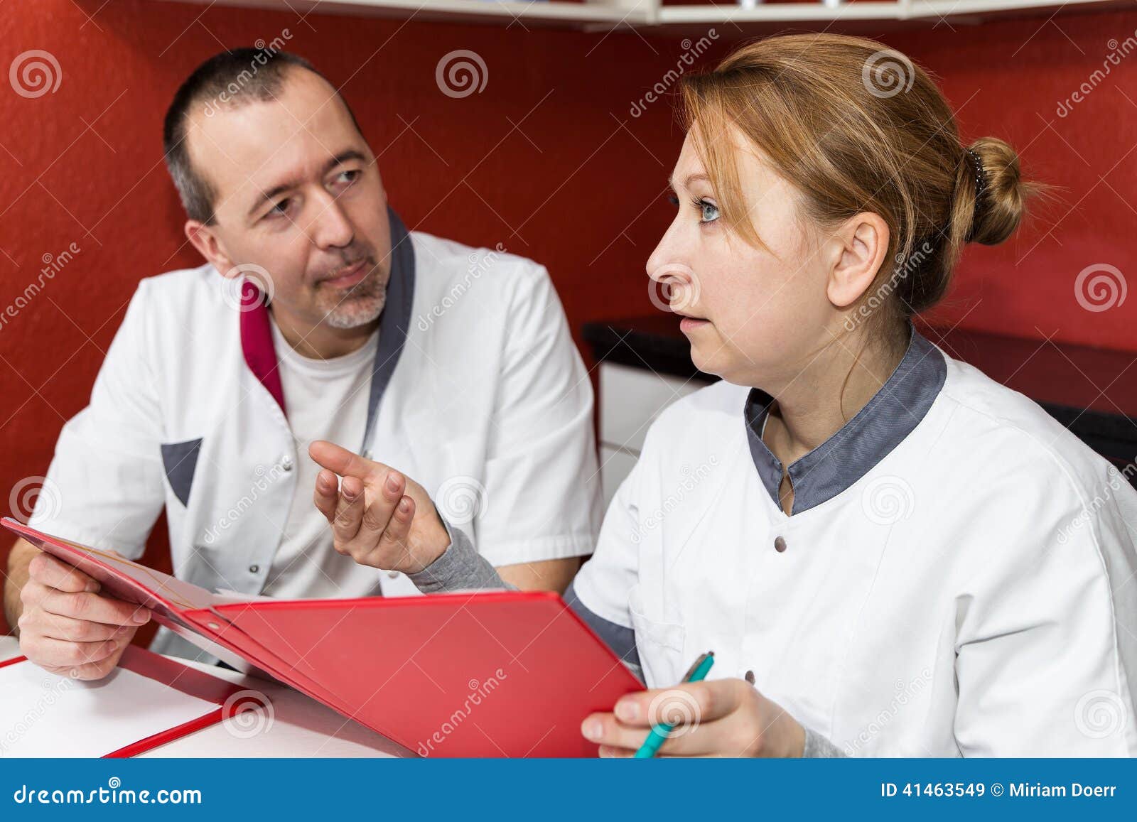 Two Doctors Having a Conversation Stock Image - Image of clinic ...