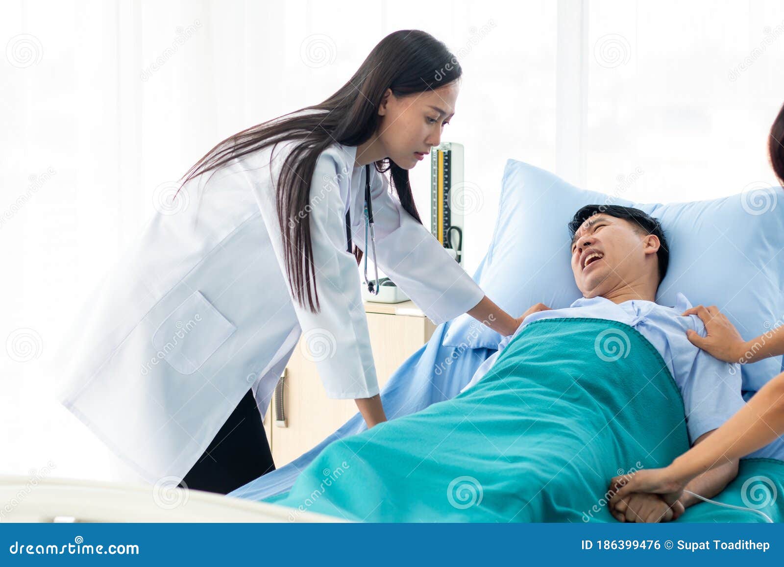 Two Doctors Holding a Psycho Patient on Bed in Hospital Stock Photo ...