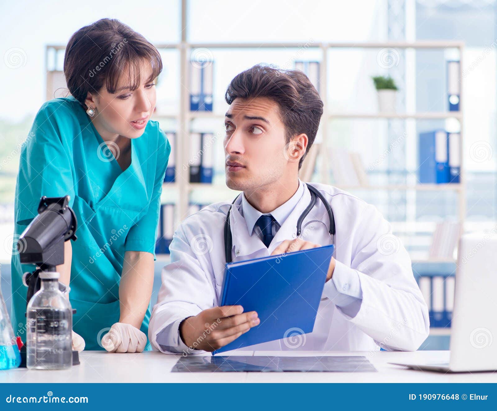 Two Doctors in the Hospital Stock Photo - Image of consultation ...